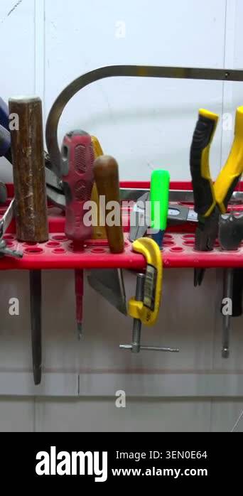Workbench Tool Shelf With Assorted Hand Tools Lined On Red Organizer ...