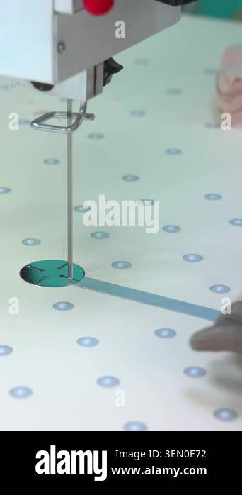 Gloved Hand Aligning Fabric Under Blade. Operator Wearing Blue Glove ...