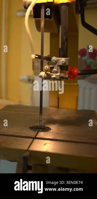 Closeup Bandsaw Blade And Table Under Warm Yellow Light, Hobbyist ...