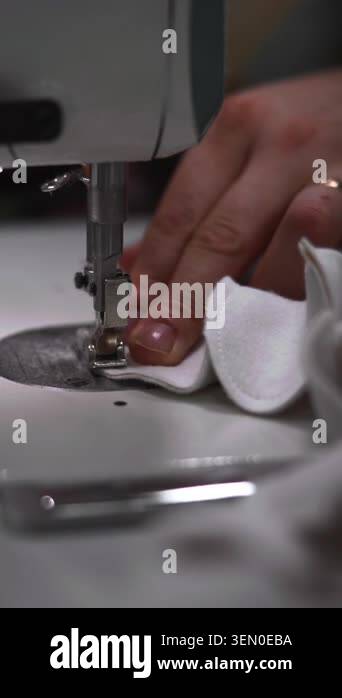 Closeup Sewing Foot Stitching White Fabric. Needle And Presser Foot ...
