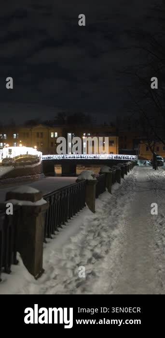 Snowy Riverside Walkway Under Streetlights, Frozen Path And Metal ...