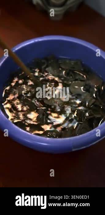 Hands Stirring Eggshells In Bowl, Wooden Stick Mixing Shells In Water ...