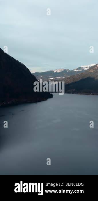 Aerial Fjord Sunrise Calm Water, Mountain Slopes Lit By Warm Light ...