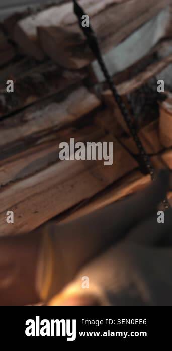 Gloved Hand Opening Wood Stove Door, Placing Fresh Kindling And ...