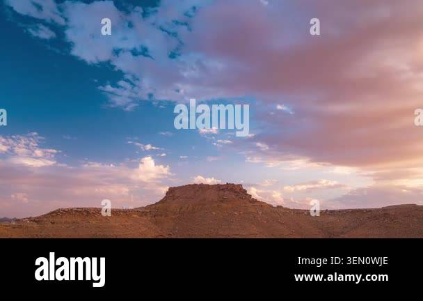 Timelapse: Ksar Beni Barka hilltop berber village at sunset, rocky ...