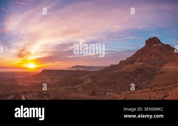 Timelapse: Ksar Guermassa hilltop berber village at sunrise, rocky ...