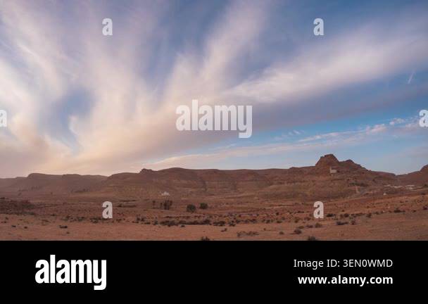 Timelapse: dramatic sunset sky at Ksar Douiret hilltop berber village ...