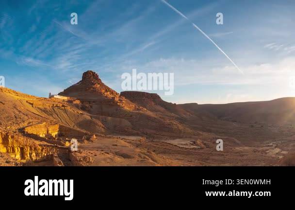Timelapse: Ksar Guermassa hilltop berber village at sunset, rocky ...