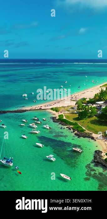 Aerial view of beach with palm trees and perfect turquoise sea water ...