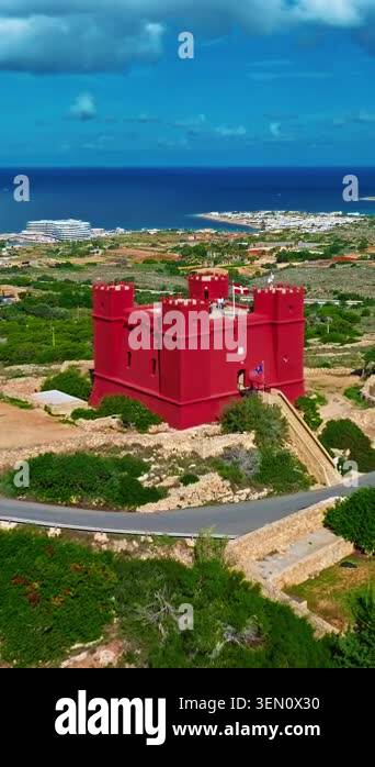 Aerial view of Saint Agathas Tower, Red Tower in Malta Stock Video ...