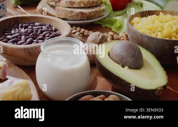 Slow camera movement along healthy food ingredients laid out on a ...