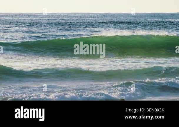 Cinematic 4K slow motion footage (150 fps) of gentle ocean waves ...
