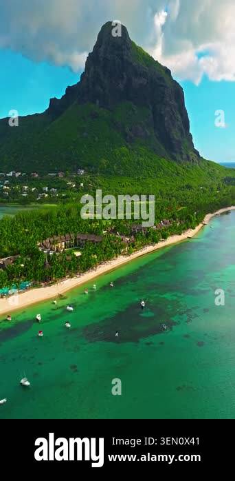 Aerial view of Le Morne Peninsula and sea lagoon formed by coral reefs ...