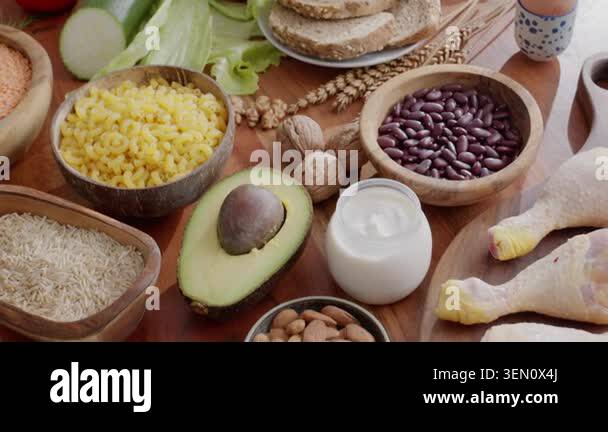 Slow camera movement along healthy food ingredients laid out on a ...