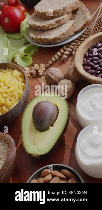 Slow camera movement along healthy food ingredients laid out on a ...