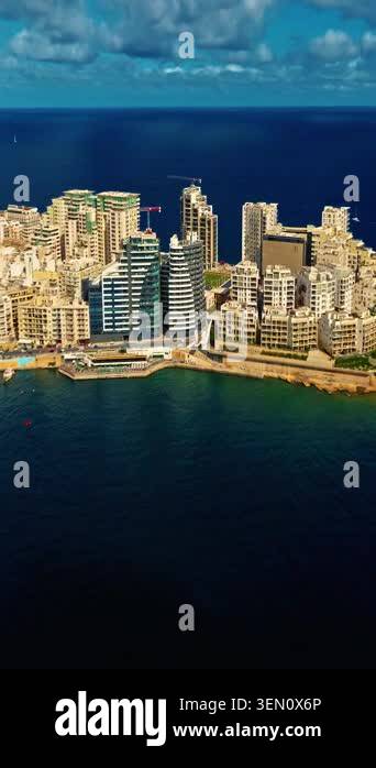 Aerial view of Sliema with modern real estate and a beautiful ...