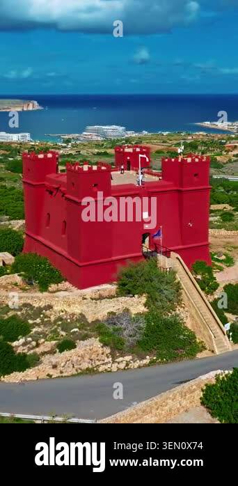 Aerial view of Saint Agathas Tower, Red Tower in Malta Stock Video ...