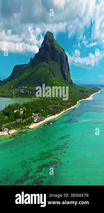 Aerial view of Le Morne Peninsula and sea lagoon formed by coral reefs ...