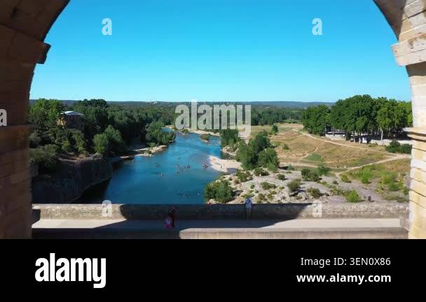 The Pont du Gard is an ancient Roman aqueduct, France, that is depicted ...