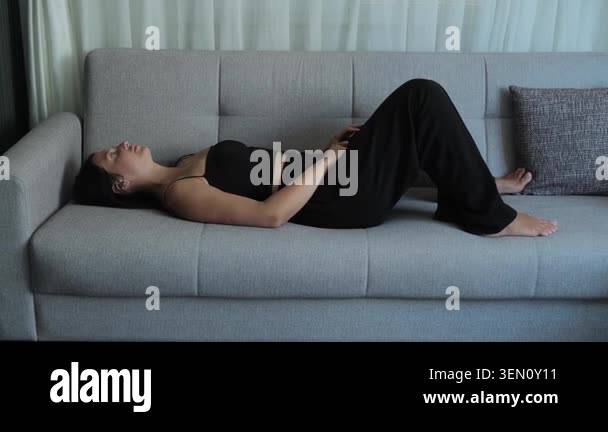 Emotional exhaustion and depression concept with young woman lying on ...