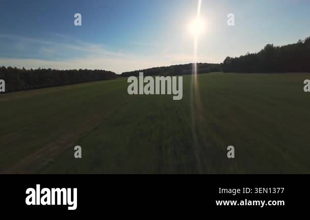 Dynamic FPV drone footage capturing sweeping aerial views of vast ...