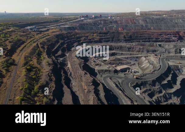 Huge iron ore open pit mining of iron ore aerial 4K video Stock Video ...