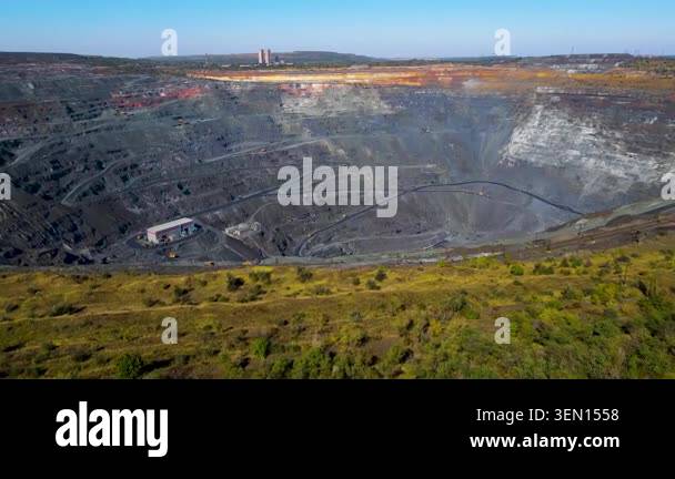 Huge iron ore open pit mining of iron ore aerial 4K video Stock Video ...