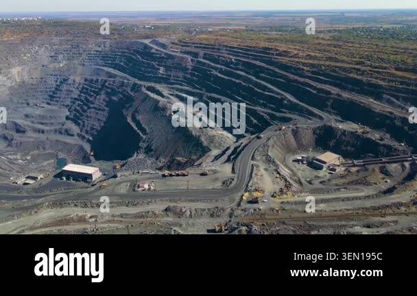 Huge iron ore open pit mining of iron ore aerial 4K video Stock Video ...