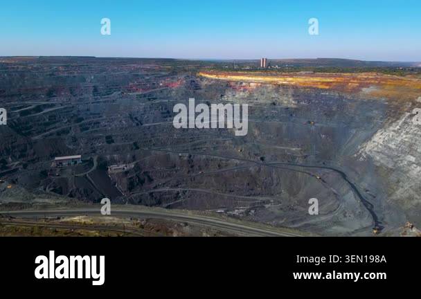 Huge iron ore open pit mining of iron ore aerial 4K video Stock Video ...