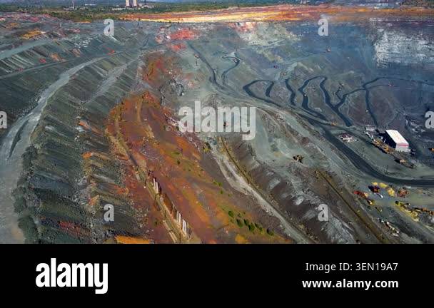 Huge iron ore open pit mining of iron ore aerial 4K video Stock Video ...
