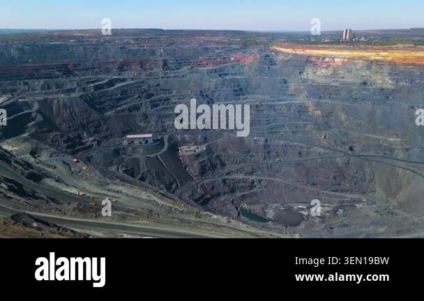 Huge iron ore open pit mining of iron ore aerial 4K video Stock Video ...