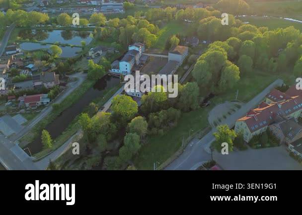 Aerial Footage of Small Residential Complex Surrounded by Dense ...