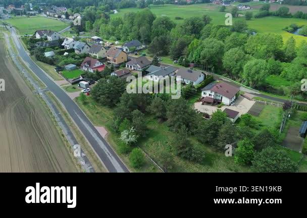Aerial Footage of Suburban Residential Area with Trees and Forest Edge ...