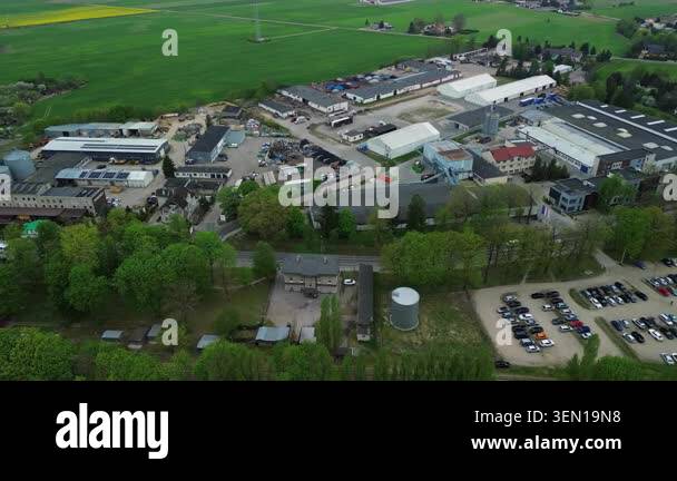 Aerial Footage of Industrial Complex with Warehouses and Solar Panels ...