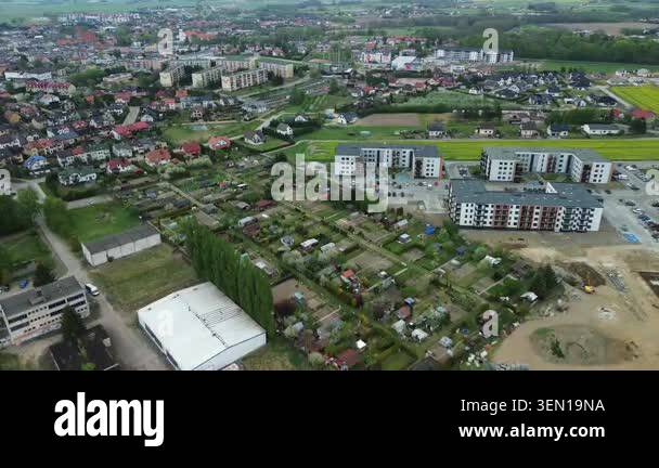 Aerial Footage of Modern Residential Building with Parking Area and ...