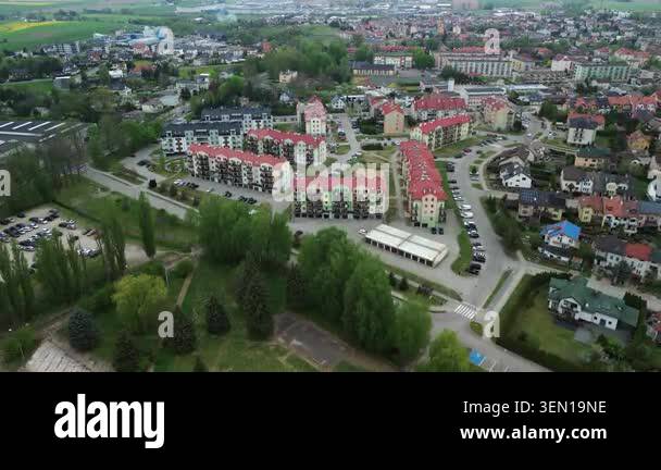 Aerial Footage of Modern Residential Building with Parking Area and ...
