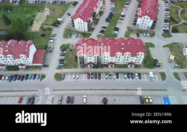 Aerial Footage of Modern Residential Apartment Complex with Parking ...