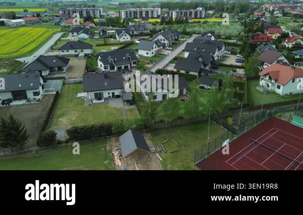 Aerial Footage of Suburban Residential Area with Curved Road and ...