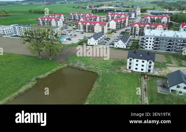 Aerial Footage of Modern Residential Apartment Complex with Parking ...
