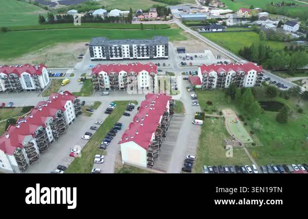 Aerial Footage of Modern Residential Apartment Complex with Parking ...
