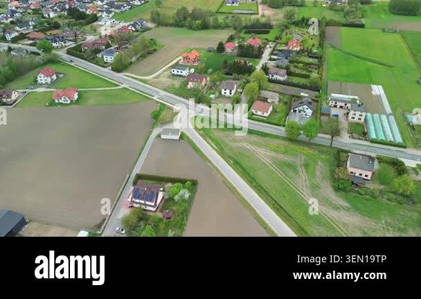 Aerial Footage of Rural Residential Area with Crossroads and Farmland ...