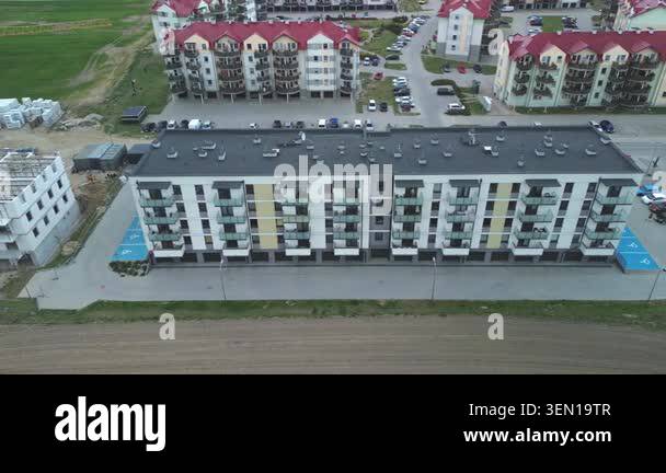 Aerial Footage of Modern Residential Apartment Complex with Parking ...