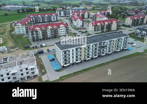 Aerial Footage of Modern Residential Apartment Complex with Parking ...