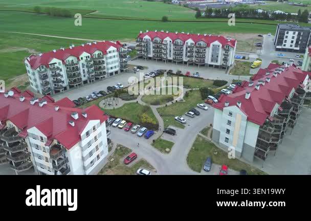 Aerial Footage of Modern Residential Apartment Complex with Parking ...