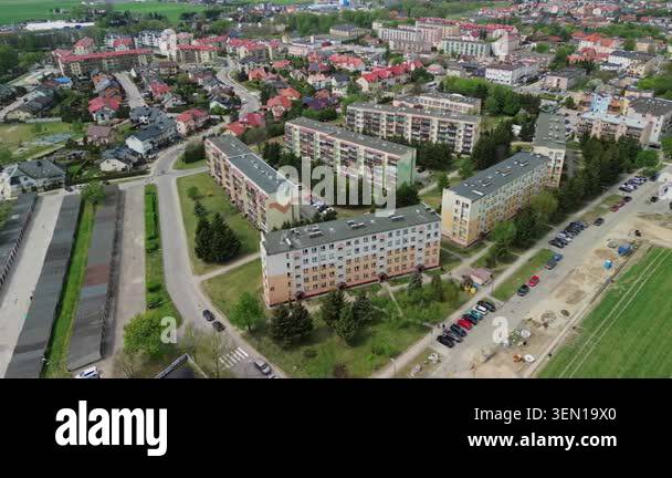 Aerial Footage of Modern Residential Building with Parking Area and ...