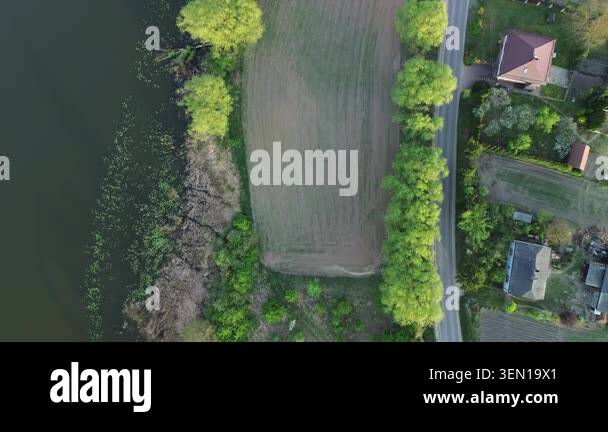 Aerial Footage of Rural Residential Area Near Lake and Forest Road 4K ...