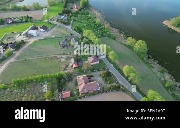 Aerial Footage of Rural Residential Area Near Lake and Forest Road 4K ...