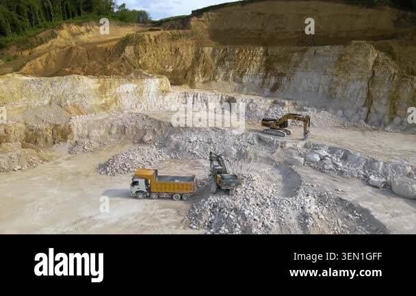 Open pit mining of construction sand stone materials with excavators ...