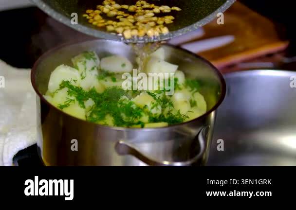 Video one shows pork cracklings sizzling until golden in a frying pan ...