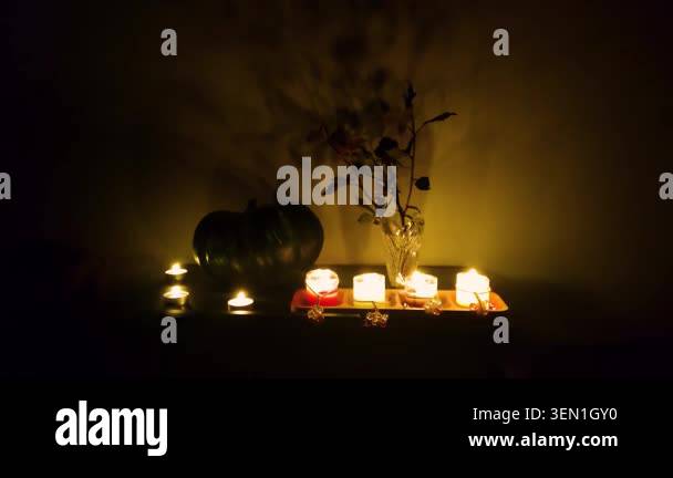 Group of burning candles on black background. Halloween candles burning ...